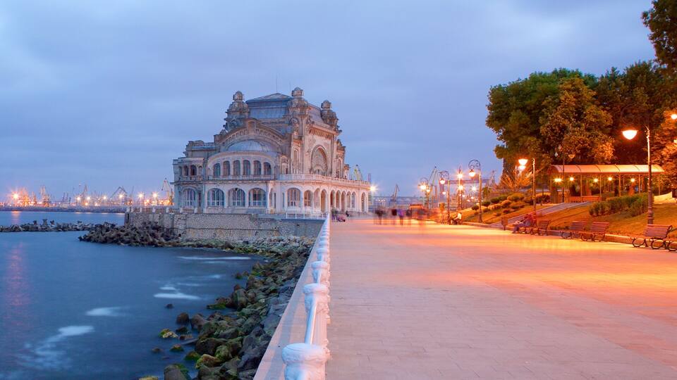 Constanta Casino featuring a sunset and rocky coastline