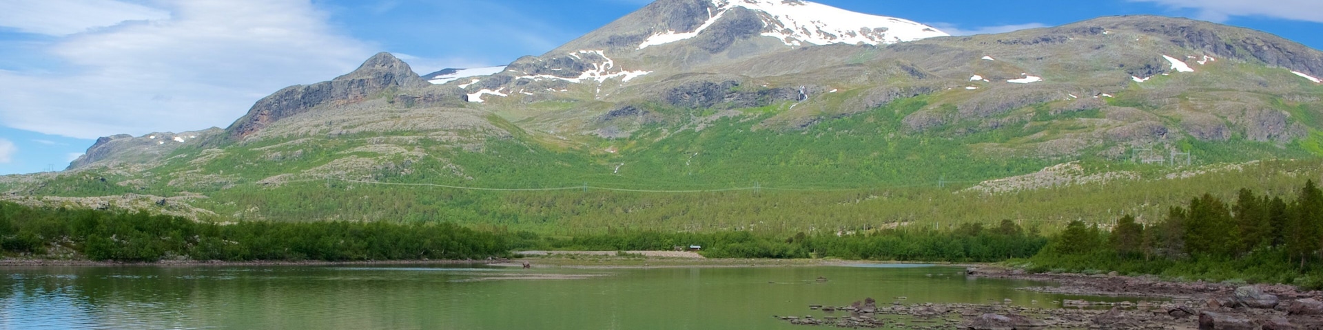Stora Sjofallet National Park featuring a lake or waterhole and mountains