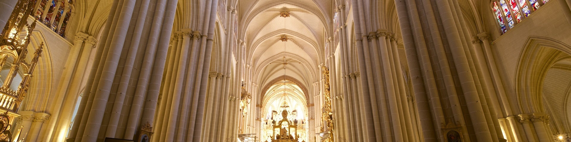 Toledo Cathedral which includes heritage elements, a church or cathedral and interior views
