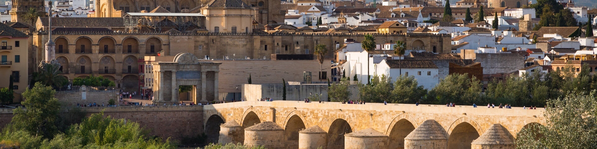 Roman Bridge which includes a city, a bridge and landscape views