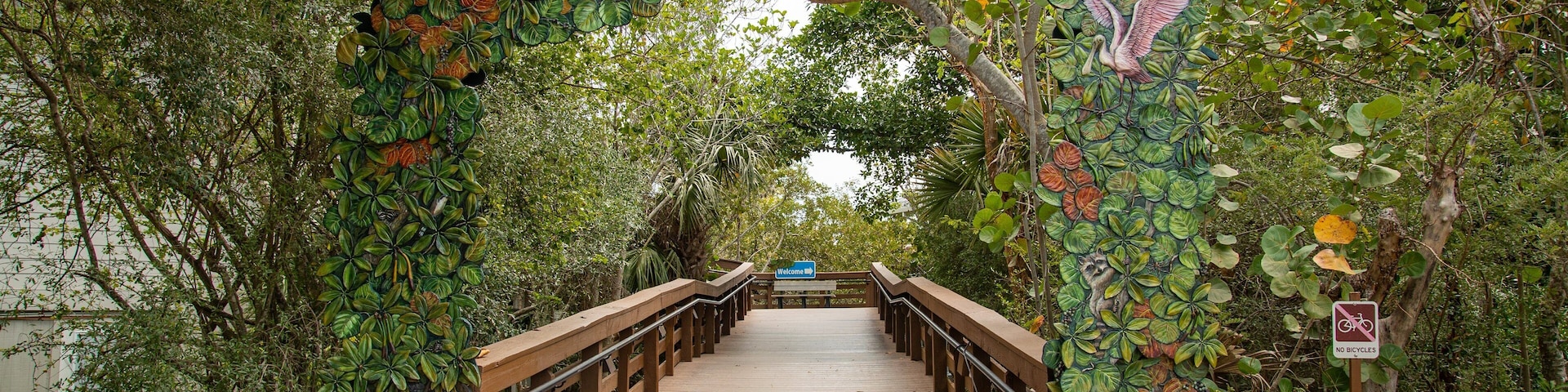 J. N. Ding Darling National Wildlife Refuge showing a bridge and signage