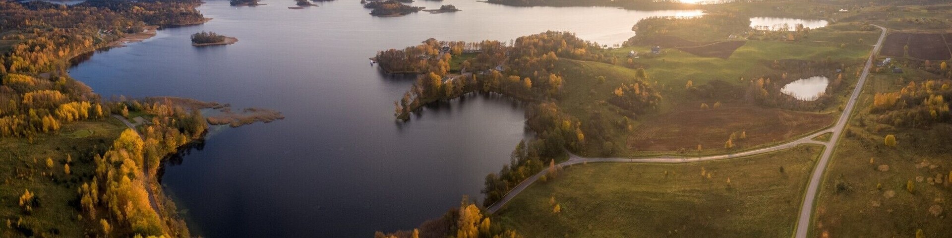 On our way to Užutrakis Manor, we were crossing through what the locals call the old Potato Road, but if you’re hoping to see the potato fields, it’s not going to happen. Instead you will get a fantastic scenery along the lake Galvė with the picturesque views of the old Trakai Castle. You also get a chance to go on a few viewing platforms along the way for great photos or a tranquil moment to enjoy the calm of the nature. We were told that the Potato Road was used by the locals who worked in the Užutrakis Manor as they rarely travelled by water, however, soon there should be an opportunity to do that too.
