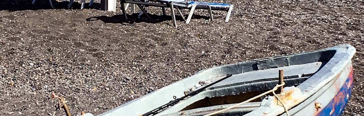 #BVSBlue
Santorini's volcanic history has led to the formation of some of the more unique beaches in the Greek Isles, and Kamari is no exception. Sitting about 4 miles southeast of Fira on the island's east coast, this stretch of black sand is one of the largest in Santorini. The beach is backed by the town of its namesake, a popular resort area where you'll find numerous hotels, restaurants, beachside bars and shops. On the beach, visitors can take advantage of the available lounge chairs and umbrellas.
Travelers enjoyed the clear blue waters of Kamari and suggested planting your feet towards the southern portion of the shore. That's because the views of the imposing Mesa Vouno hill, where you can find Ancient Thira, makes for a picture-perfect Greek beach setting. No matter where you decide to kick back on Kamari Beach, travelers strongly suggest bringing protective footwear. The sand and pebbly terrain can get quite hot with the sun beating down on it, especially after a couple hours, so bring sandals if you're hoping to spend the day on the beach. Some visitors even suggested bringing water shoes, commenting that the underwater terrain at the shore quickly goes from sand to slippery solid rock.