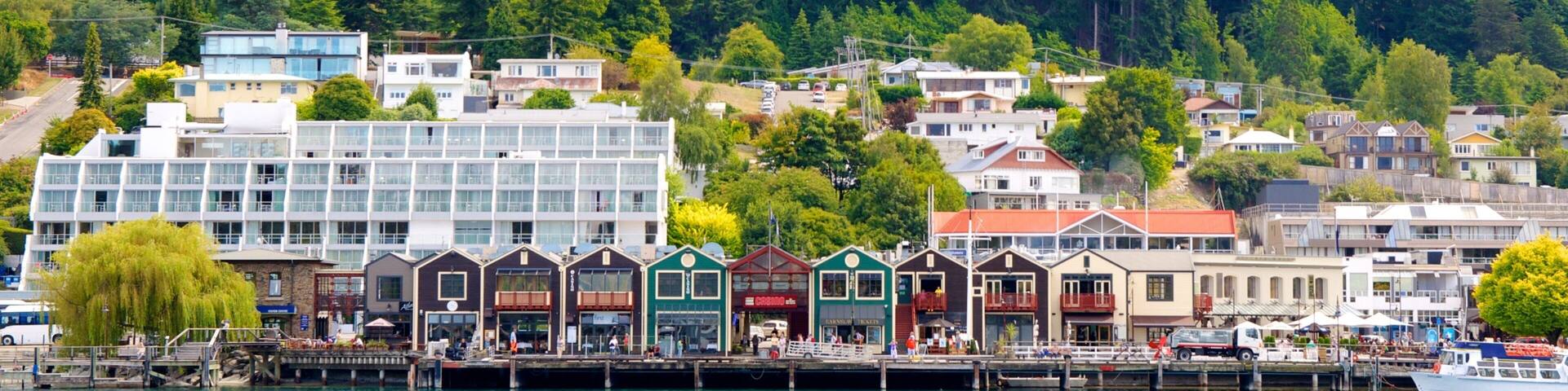 Steamer Wharf which includes a bay or harbor, a coastal town and forests