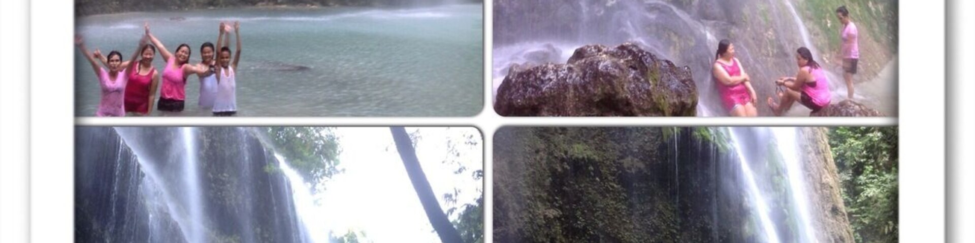 Uma cascata com pessoas apreciando a paisagem.