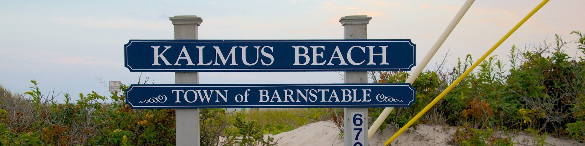 Kalmus Beach which includes signage and general coastal views
