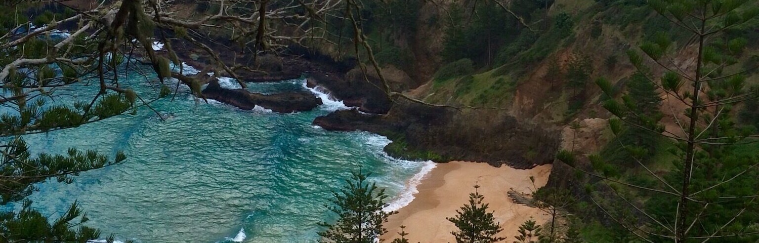 "Anson Bay"
Secluded Anson Bay is on the west coast of Norfolk Island.
A walking track winds down to the beach which is hugged by steep cliffs.
At the cliff top there is a reserve with picnic and BBQ facilities.
It is a great place to watch the sunset.
#Outdoors
#Hiking
#Green