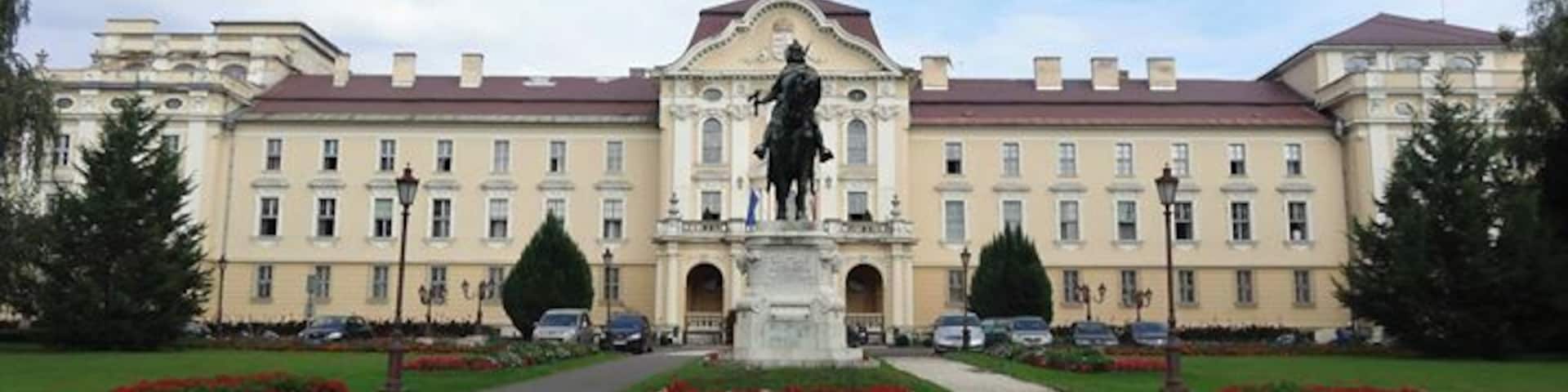 This is the main entrance to the St Stephen University of my hometown in Godollo, Hungary. The city is small and cozy and has a couple of nice attractions and landmarks such as a castle, the university, city museum and a market. Godollo is surrounded by forests and hills. They are perfect for an adventure on your bike or by car. Budapest, the capital city is only a short 30-40 minutes drive away. I love coming home here. 
#Godollo #Hungary #GodolloCity