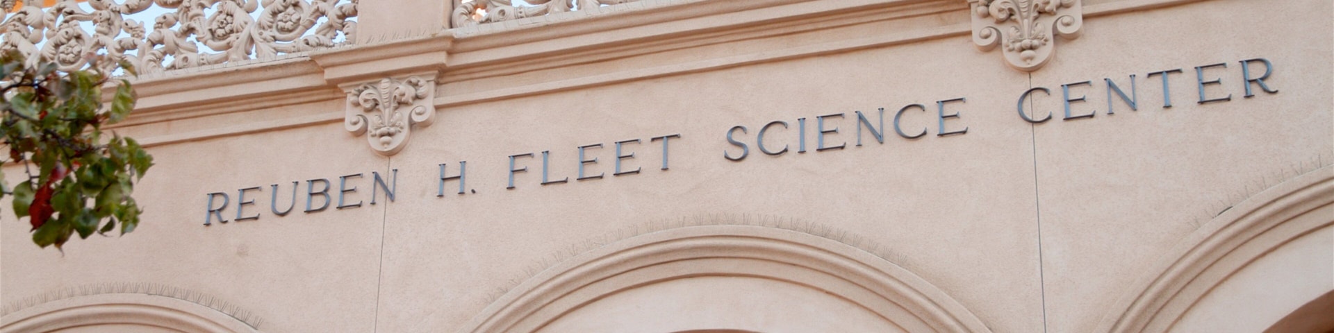 Fleet Science Center featuring signage and heritage elements