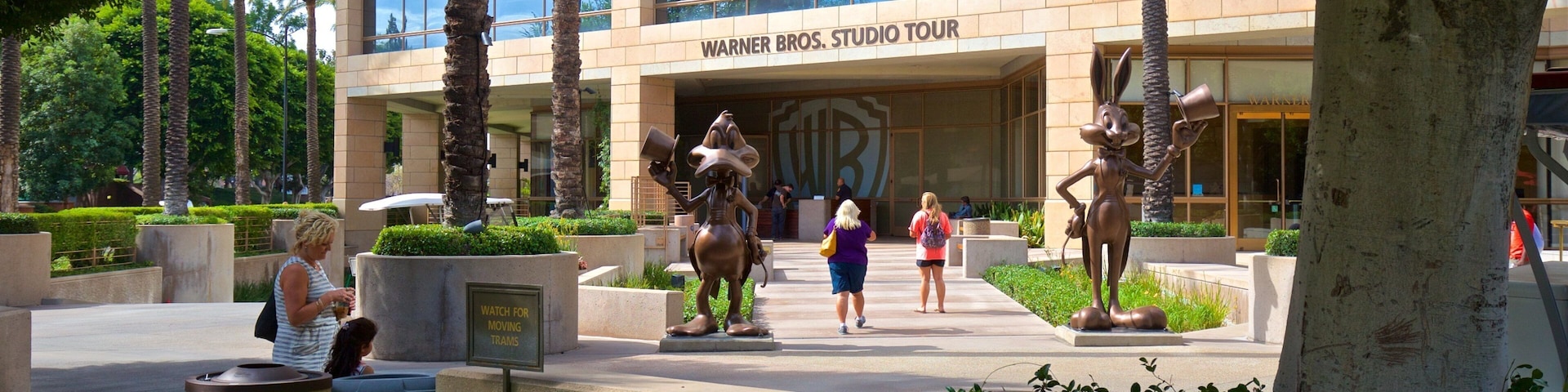 Warner Brothers Studio which includes a statue or sculpture, outdoor art and a park