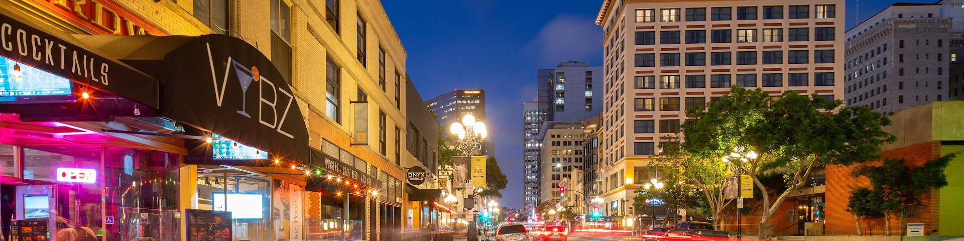 Gaslamp Quarter which includes night scenes and a city