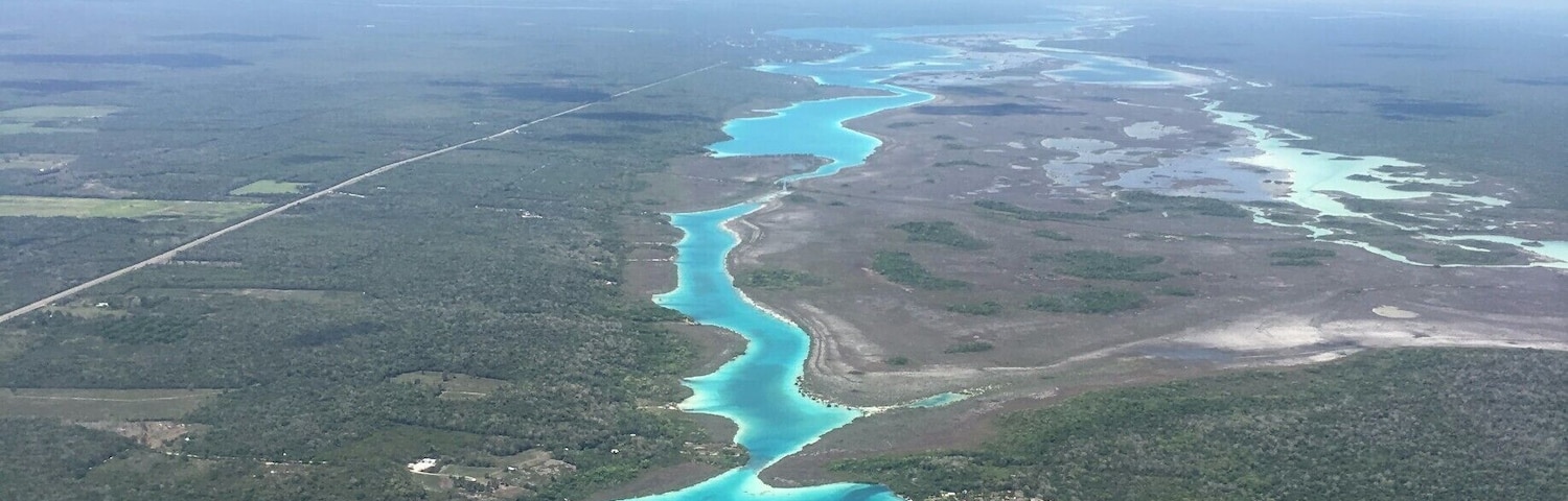 The most beautiful summer paradise hidden away in Mexico. Bacalar Lagoon has 7 different types of blue because of the overflowed cenotes. I recommend staying at Akal Ki Hotel and staying for about 3-4 days to make the most of it. #LifeAtExpedia