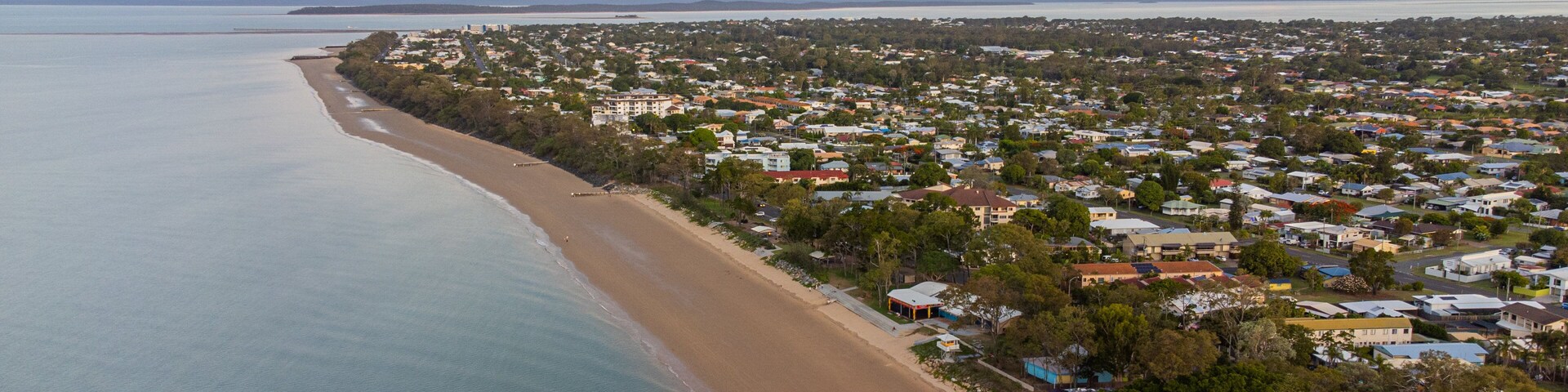 Torquay showing a sandy beach, general coastal views and a sunset