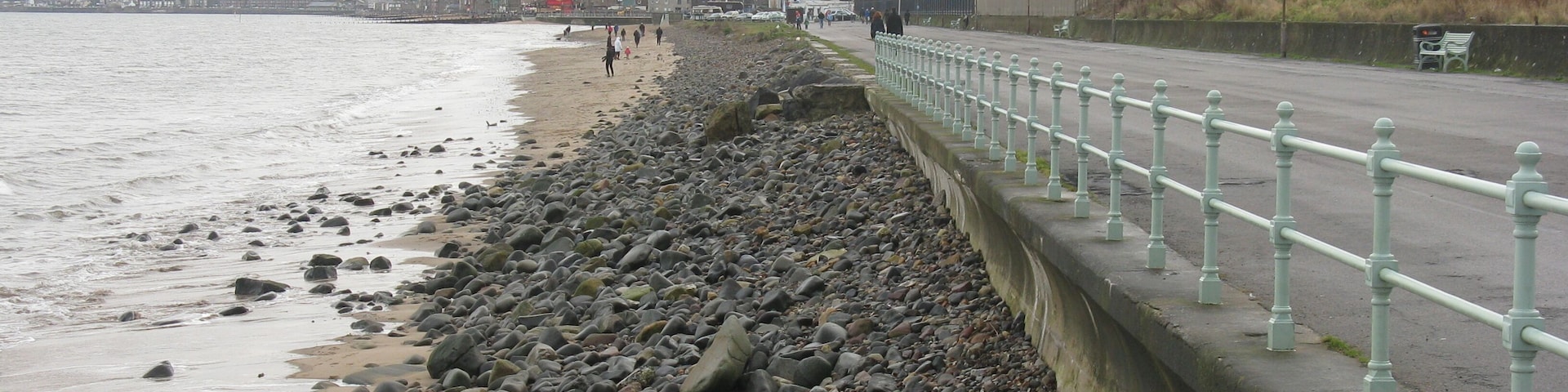 The view south down the beach and promenade in Portobello. The big shed on the right is the end of Marine garage of Lothian Buses.