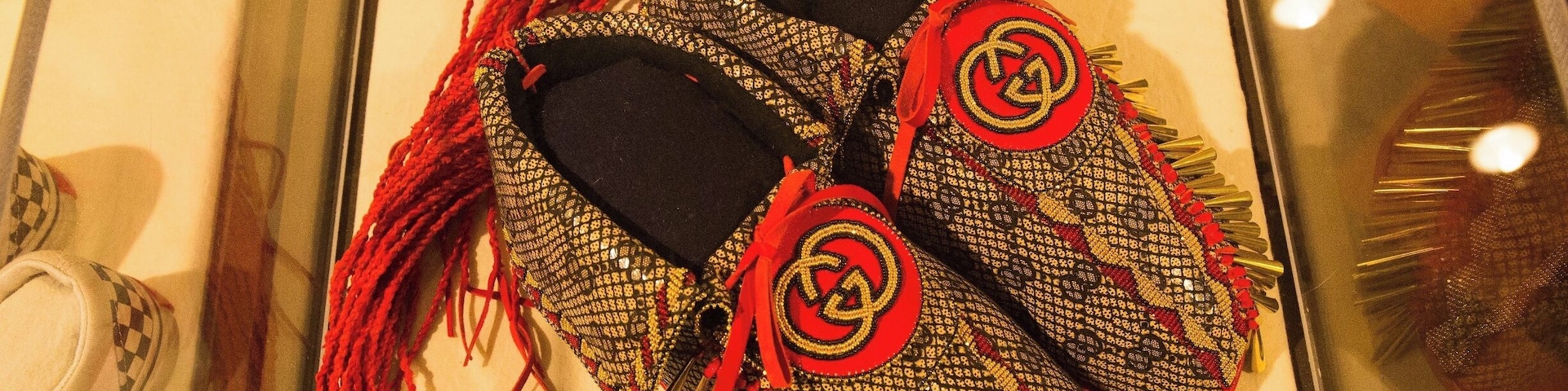 Some pieces are contemporary, and decidedly on the whimsical side.
This one is entitled "If Gucci Were a Straight Dancer from Oklahoma" by Angela Swedberg (2015)