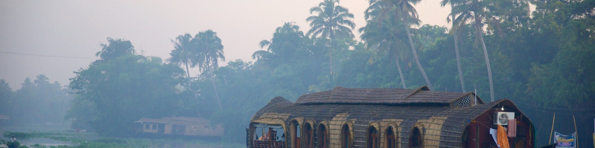 Alappuzha District showing a house and a river or creek