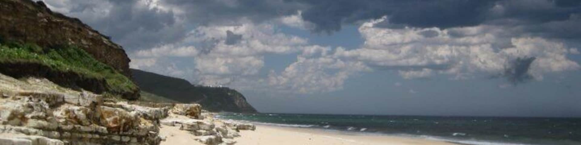 A summer storm breaking at the beach near Glenrock Lagoon.
