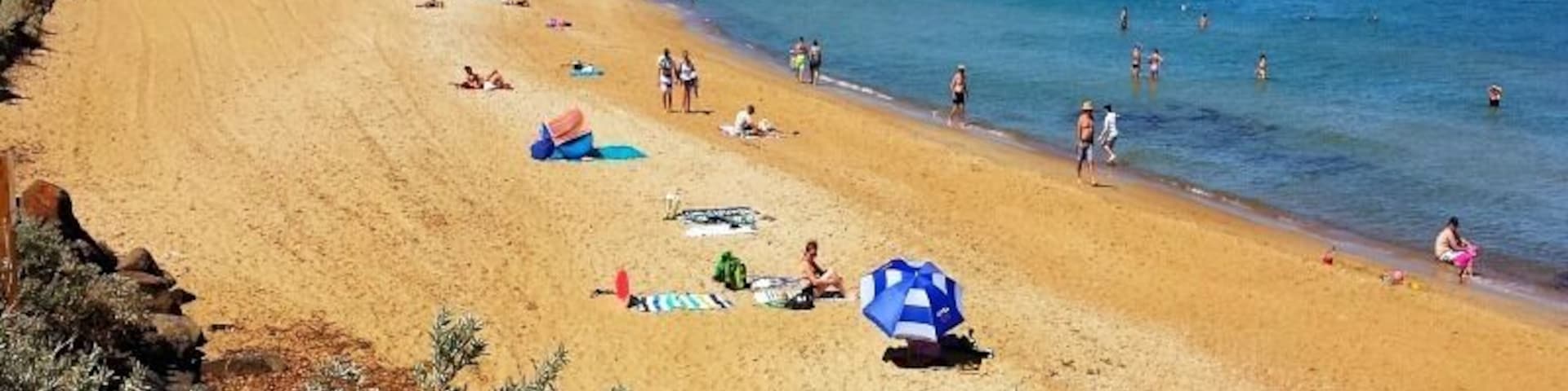 Parkdale Beach was a great find for us, thanks to our friend who lives in a nearby suburb. It’s a bit of a drive from the city centre, 23 km south-east, but if you’re looking to get away from the crowds of St Kilda it’s a great place to relax and swim with the kids.
The water was again clean and calm and with the shallow bars you could walk quite a ways out. It’s best to stay on the shallower bars and clear of the rocks and reefs area.
Whilst there don’t miss having breakfast or brunch at Parkdale Beach Cafe + Kiosk which is right on the beach. With it’s outdoor deck you can watch the kids play on the grass, and the food and coffee was really good.