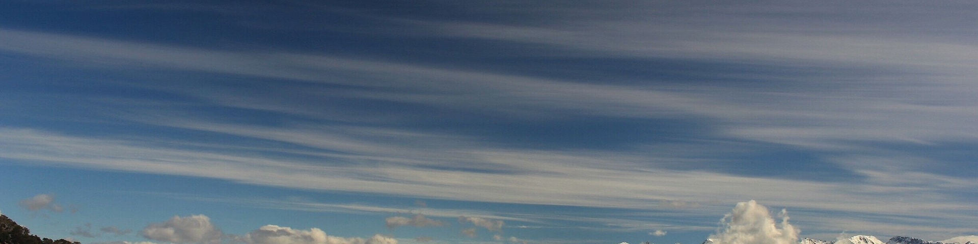 Gorgeous farm house under a gorgeous sky. It's ALWAYS golden hour this far south!