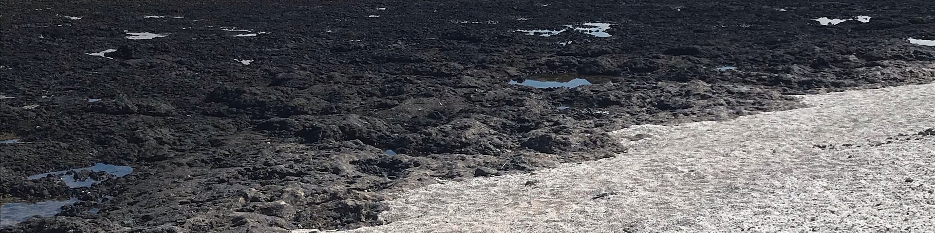 This amazing beach has lots of skeletal calcium carbonate remains of Rhodoliths which is the white ‘stone’. It gives the appearance of popcorn which also gives the beach its name. The island in the distance is Lanzarote.