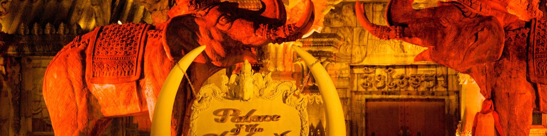 Phuket Fantasea showing a statue or sculpture, interior views and signage