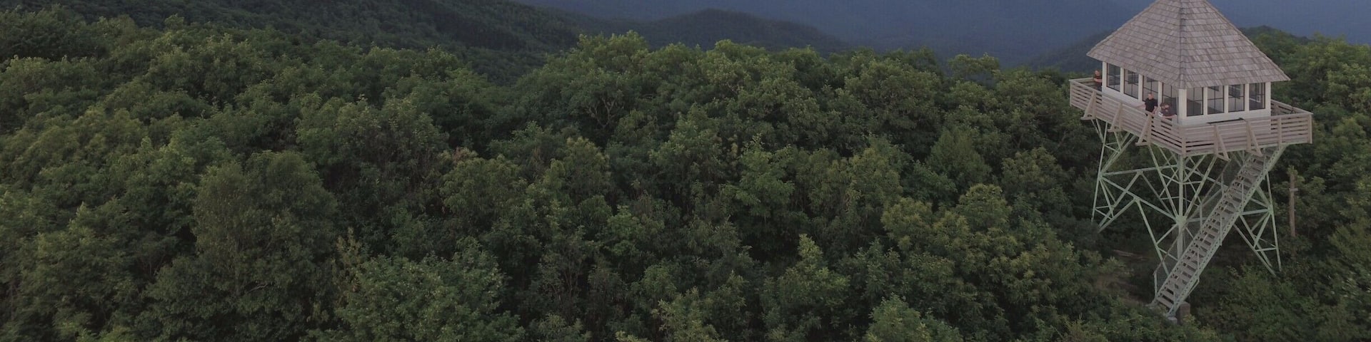 An old fire watch tower that you hike to and enjoy some great views. It is directly off the Blue Ridge Parkway and is definitely a unique destination. You can watch a video about it here: https://www.hdcarolina.com/episode/green-knob-lookout-tower