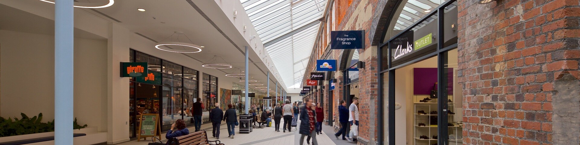 Swindon Designer Outlet showing shopping and interior views as well as a small group of people