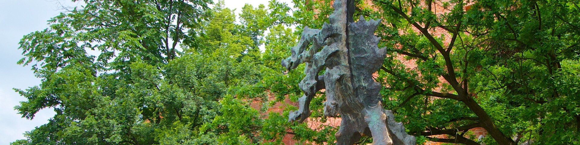 Dragon\'s Den showing a statue or sculpture, outdoor art and art