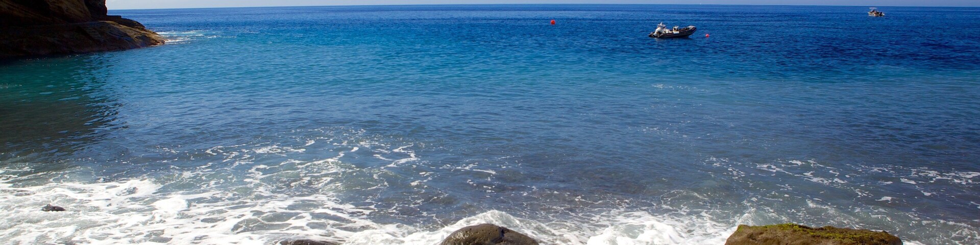Reis Magos Beach featuring a pebble beach, landscape views and general coastal views