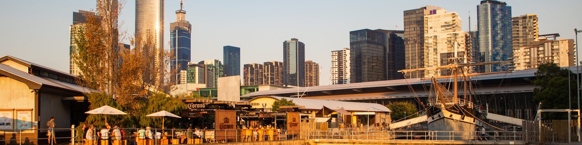Southbank Promenade featuring a bay or harbor, a sunset and a city