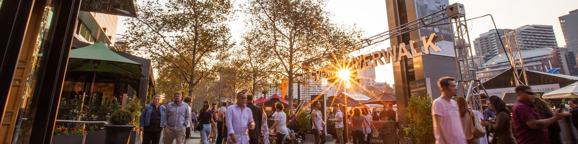 Southbank Promenade showing street scenes, a sunset and signage