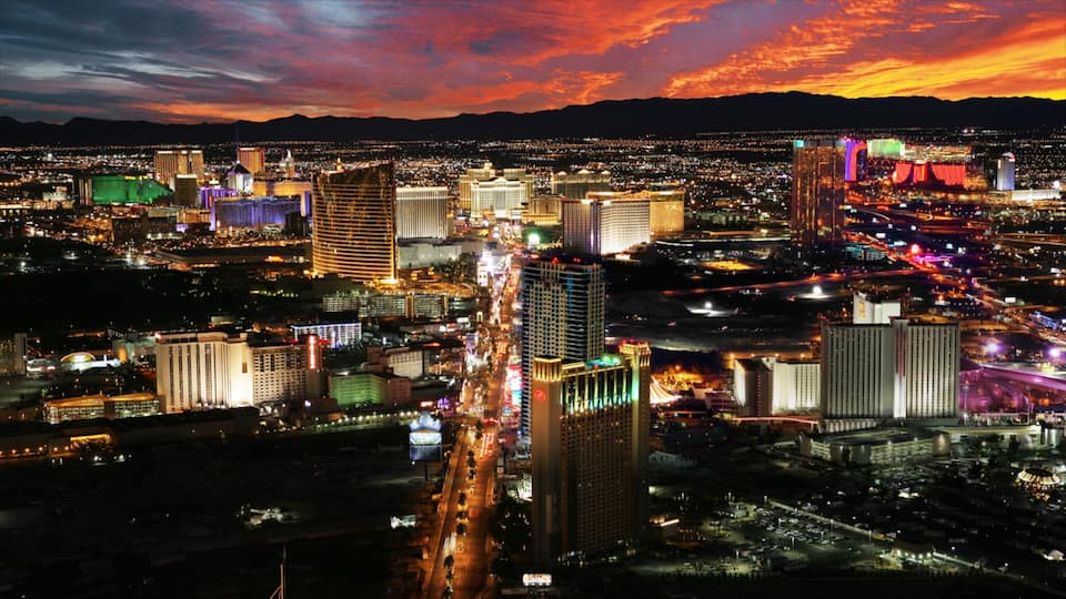 Stratosphere Tower offers breathtaking views of Las Vegas skyline at sunset with vibrant lights illuminating the city