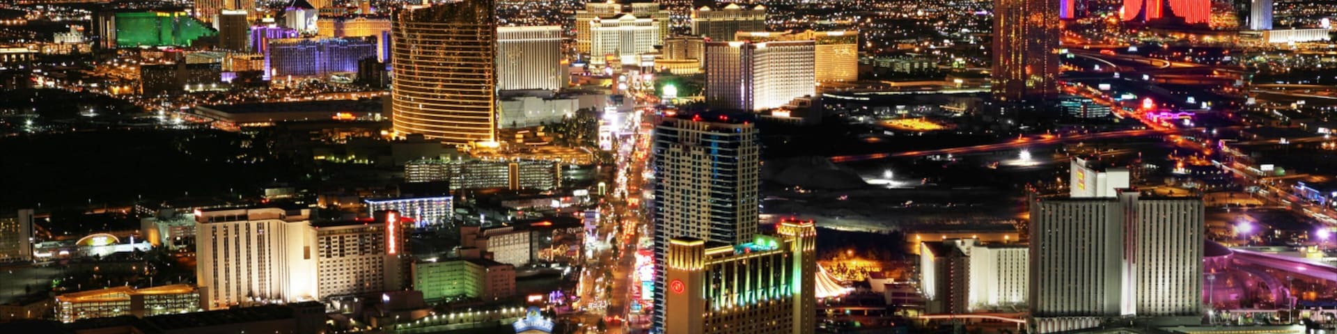 Stratosphere Tower offers breathtaking views of Las Vegas skyline at sunset with vibrant lights illuminating the city