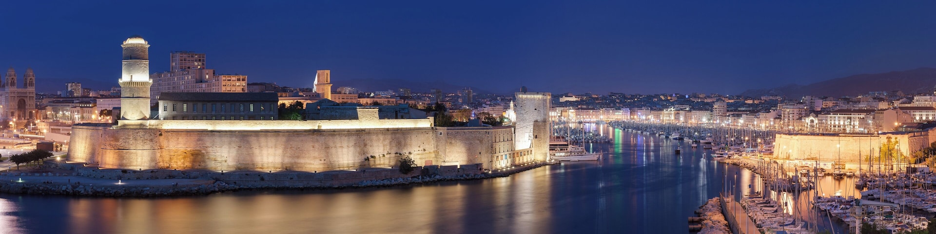 Old harbour of Marseille, at night, seen from the Pharo park. This picture is a mosaic of 4 landscape pictures taken at 59mm (35mm equiv.), f/8.0, 10 sec and ISO 100. Sitching was done with Hugin and Enblend.