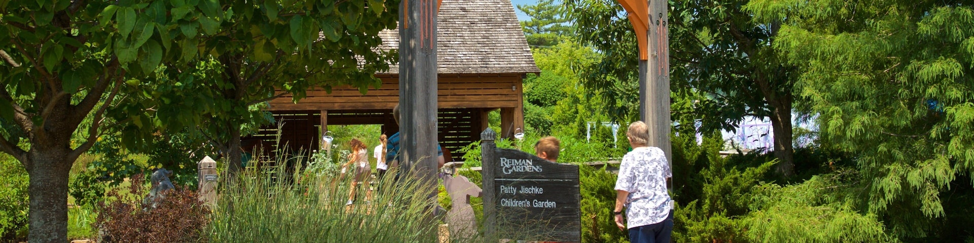 Reiman Gardens which includes a park and signage as well as a family