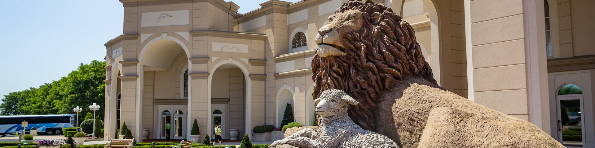 Sight and Sound Theatre showing outdoor art and a statue or sculpture