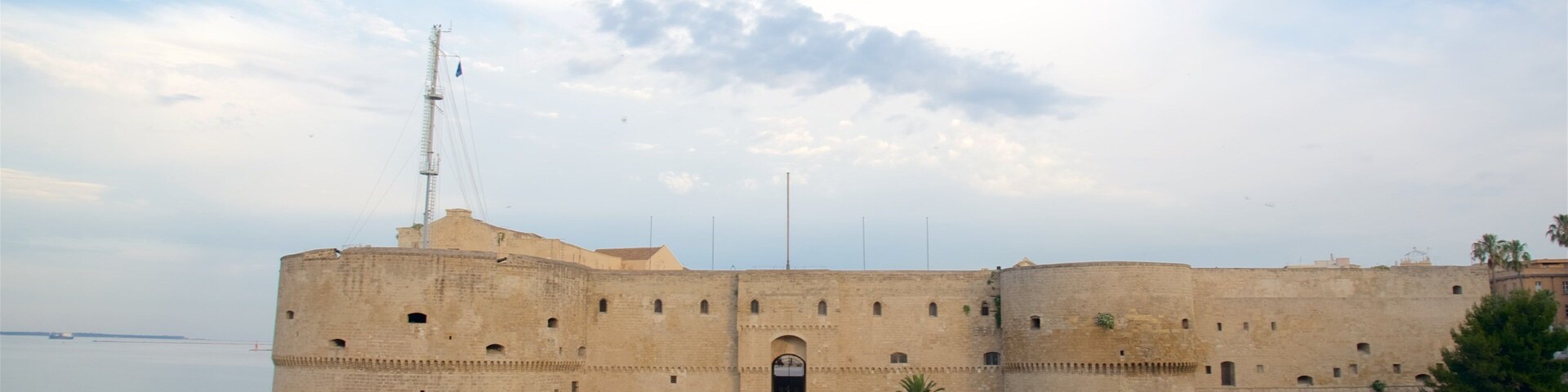 Aragonese Castle showing a castle, heritage elements and general coastal views