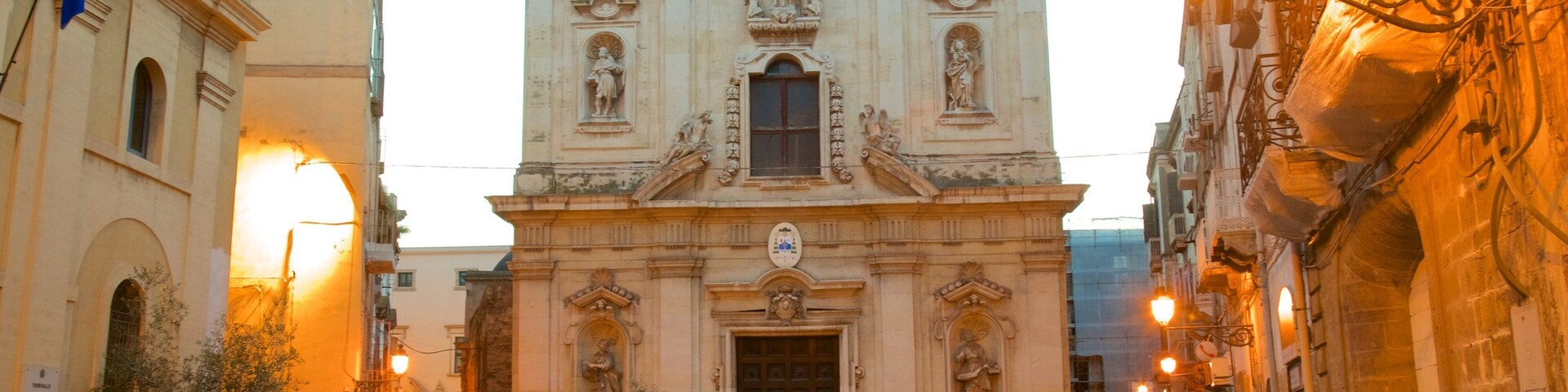 Taranto which includes street scenes, a church or cathedral and heritage architecture