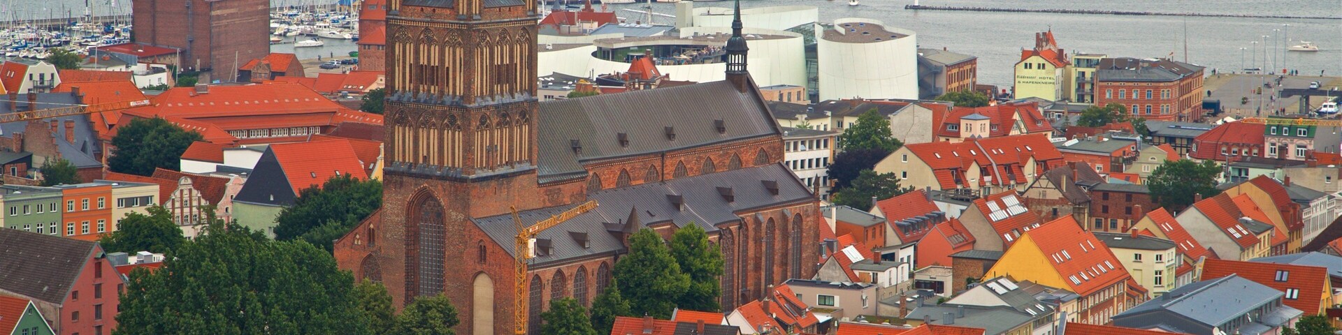 St. Mary\'s Church Stralsund featuring heritage architecture, a coastal town and landscape views