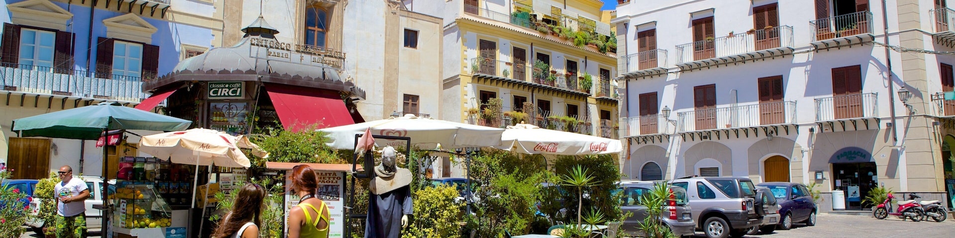 Mercato del Capo que inclui uma praça ou plaza e uma cidade pequena ou vila