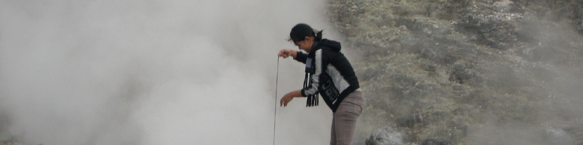 Boiling an egg in the heat from the sulphur outlets. It was hot and smelly down in the crater. But this was a unique experience because it came without all the precautions normally put in place for tourists - that's good and bad don't you think? #crater