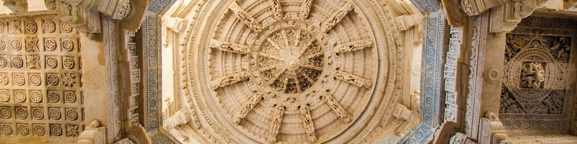 Beautifully carved highest dome supported by eight pillars of massive light-coloured-marble Jain Temple at Ranakpur in Rajasthan (India) was not built by a King or Ruler, instead it is product of a divine vision of a local business person. Temple dates back to 15th century. 1444 marble pillars, carved in exquisite detail, support the temple. The pillars are all differently carved and no two pillars are the same. Also all the statues face one or the other statue. A truly man made miracle somewhere lost on the map of India.
#LifeAtExpedia