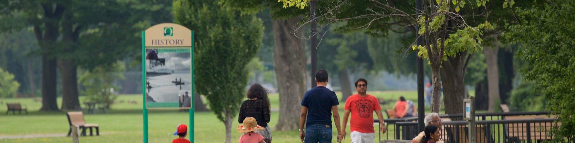 Onondaga Lake Park featuring a garden as well as a family