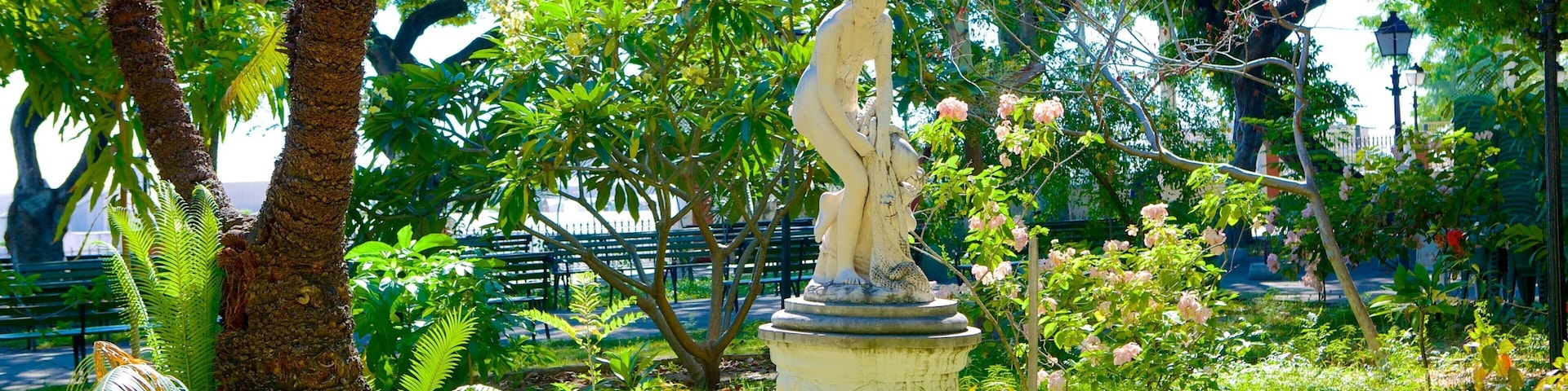 Passeio Publico which includes a statue or sculpture and a garden