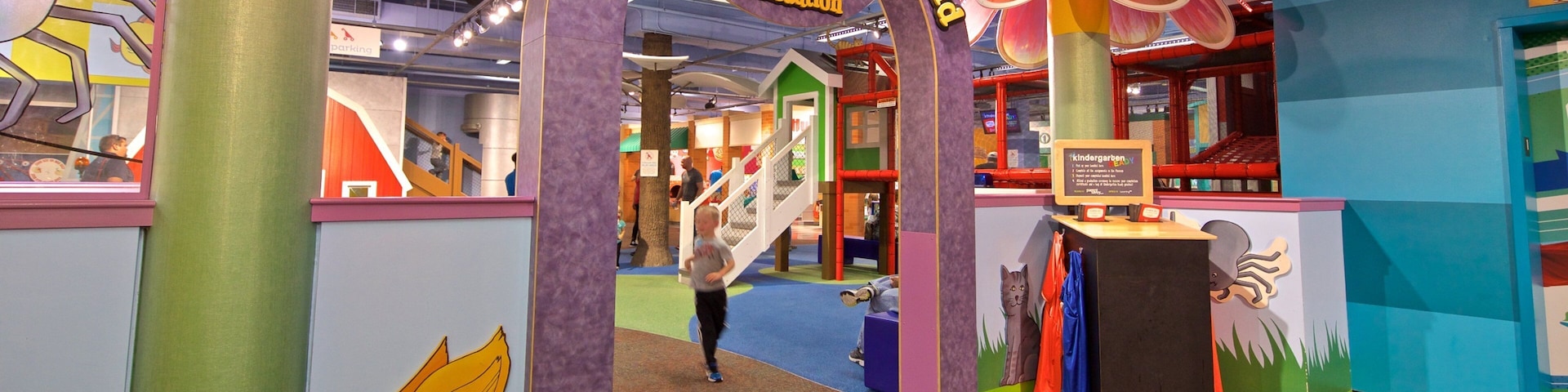 Omaha Children\'s Museum which includes signage and interior views as well as an individual child