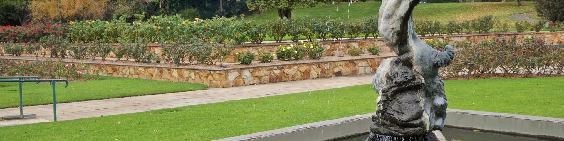 Veale Gardens which includes a garden and a fountain