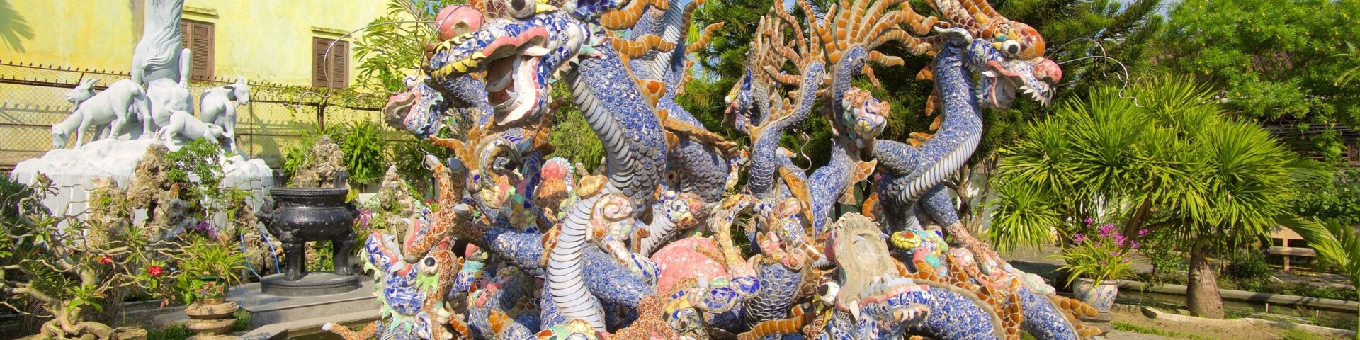 Assembly Hall of the Cantonese Chinese Congregation featuring a statue or sculpture, a fountain and a temple or place of worship