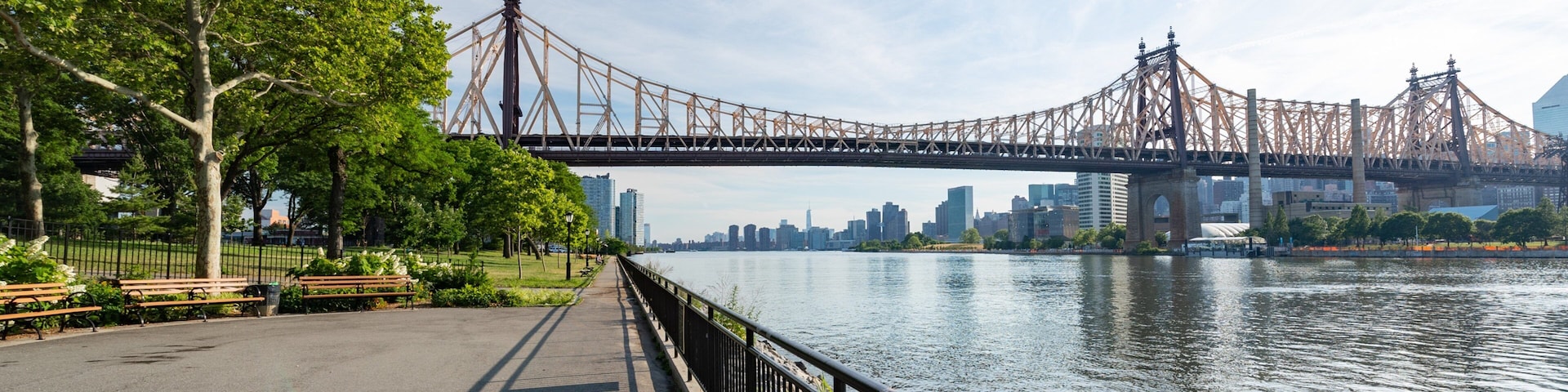 Queensbridge Park showing a river or creek and a bridge