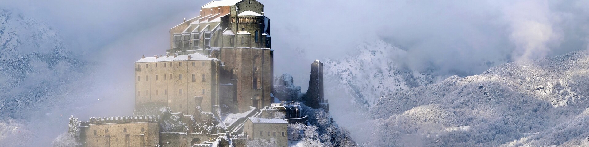 The Sacra di San Michele, sometimes known as Saint Michael's Abbey, is an architectural complex built on top of Mount Pirchiriano, situated on the south side of the Susa valley, in the Piedmont region of northern Italy. Founded between the late 10th and the early 11th century, the abbey is located along the pilgrimage route that joins Monte Sant'Angelo, in the south of Italy, to Mont Saint-Michel, in the north of France.