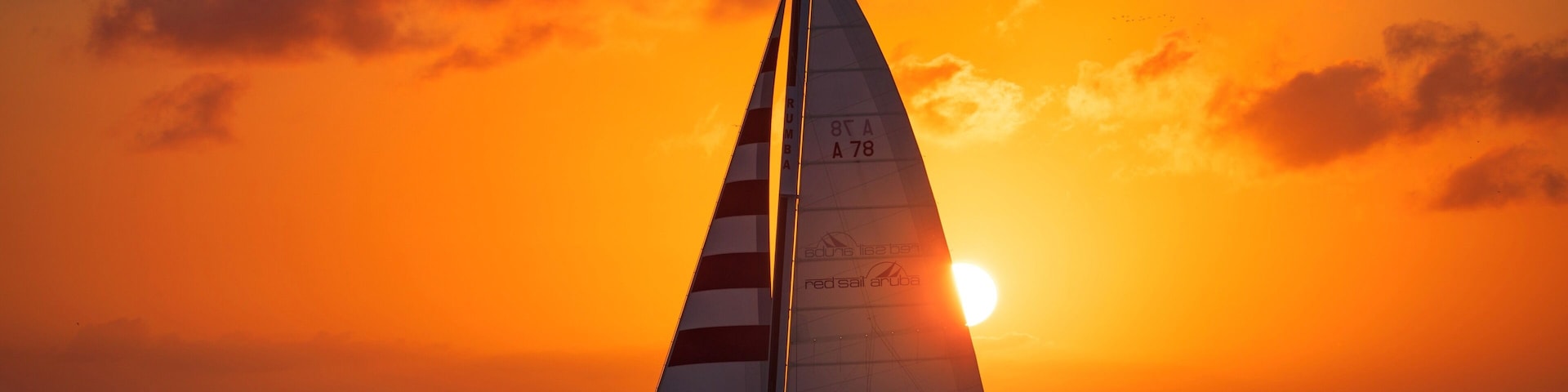 Watching the sailing boats glide across the water backlit by the setting sun at this rather low-key place on Aruba is an awesome way to end the day.